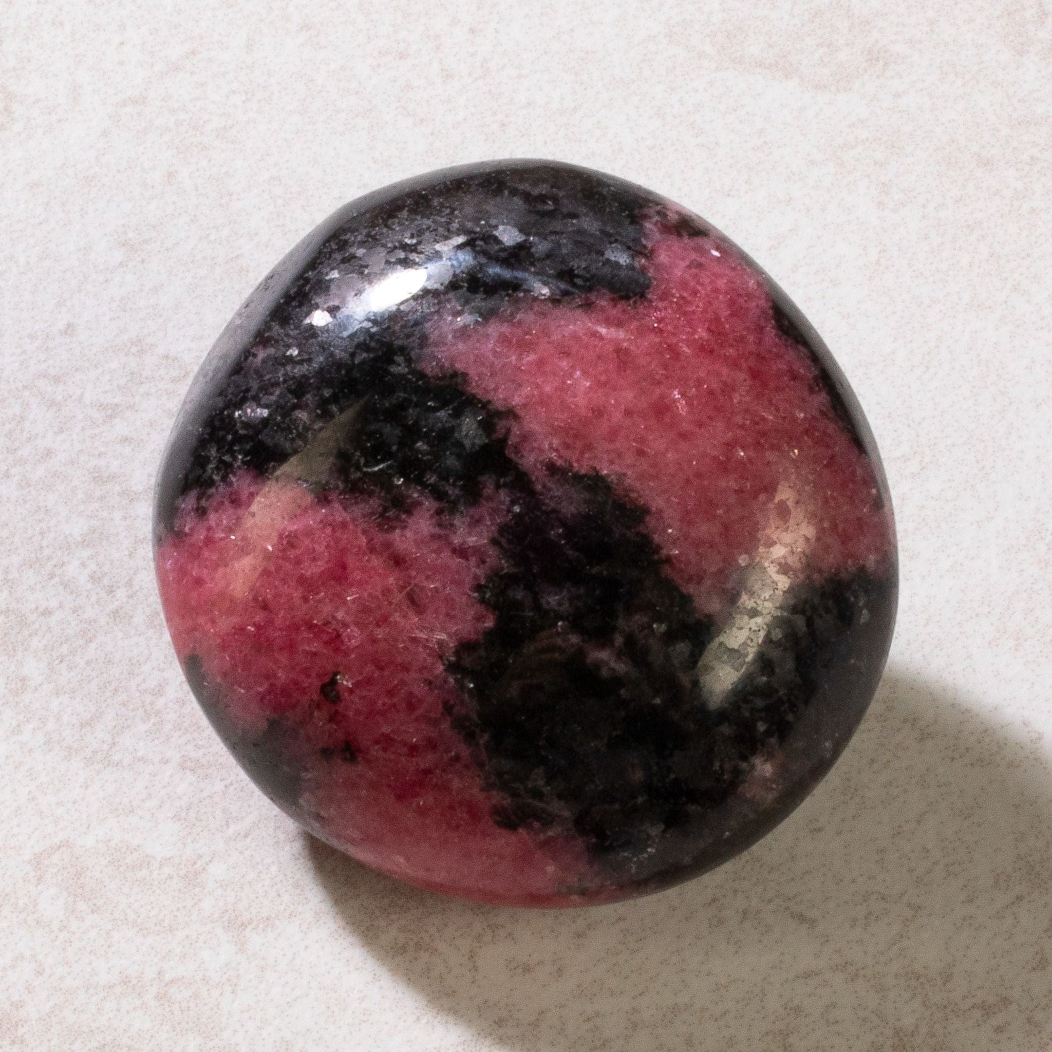 KALIFANO | Rhodonite Hand Carved Palm Stone Worry Crystal
